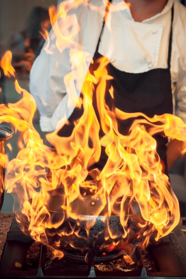 Fire Burn, Cooking on Iron Pan Stock Image - Image of cook ...