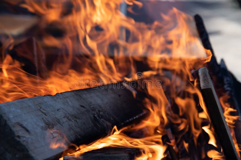 Fire burning in a grill stock photo. Image of fire, energy - 150821916