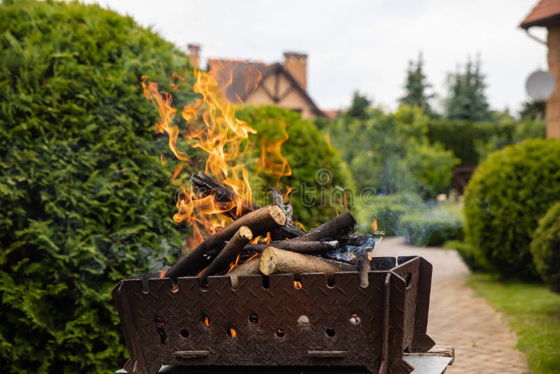 A Fire Burning in a Barbecue Stock Photo - Image of campfire, heat ...