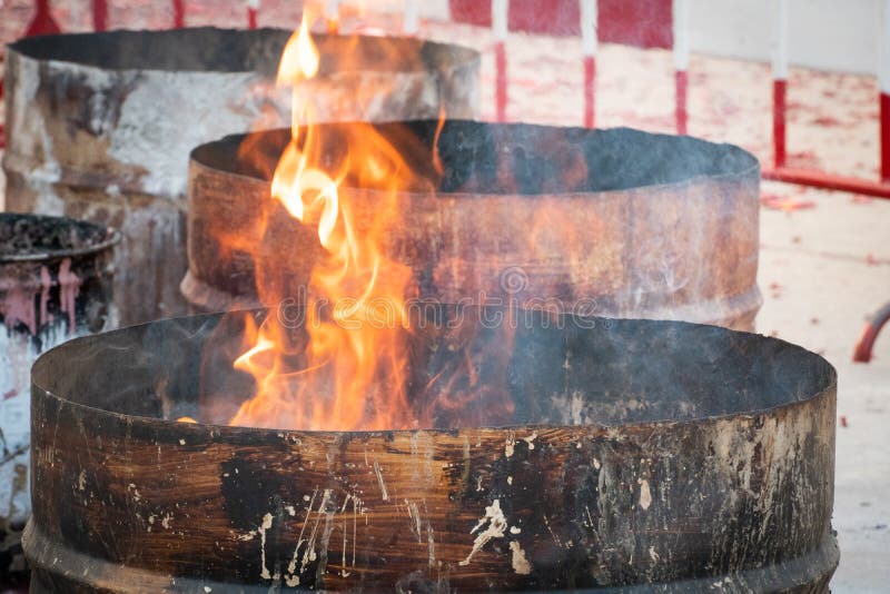 Burning Wood Fire In Oil Barrel Stock Photo - Image of environmental ...