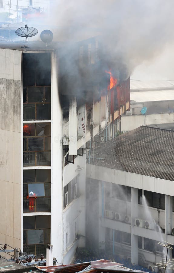 Flames and Smoke Rise from Burning Building Stock Image - Image of ...
