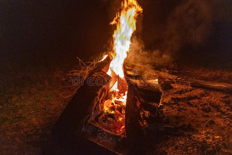 Fire Burning with Flames Rising Vertically Stock Photo - Image of ... Fire Burning with Flames Rising Vertically Stock Photo - Image of ...