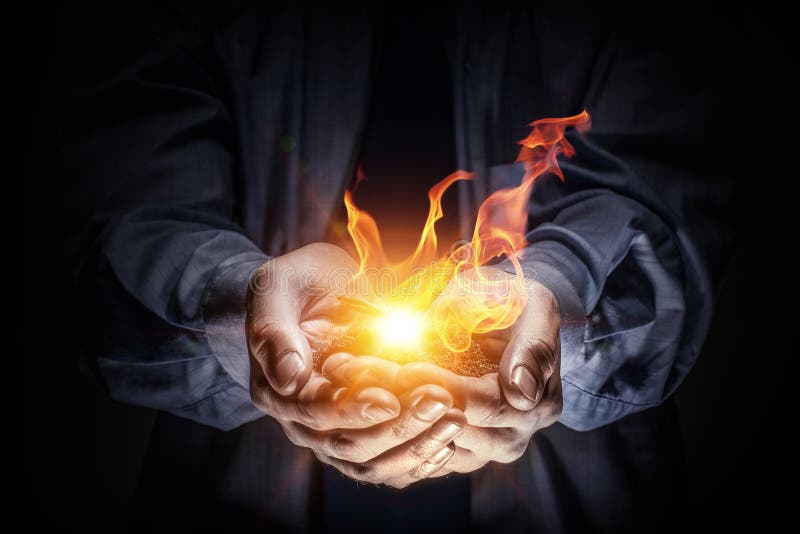 Fire burning in his hands stock photo. Image of equipment - 97435578