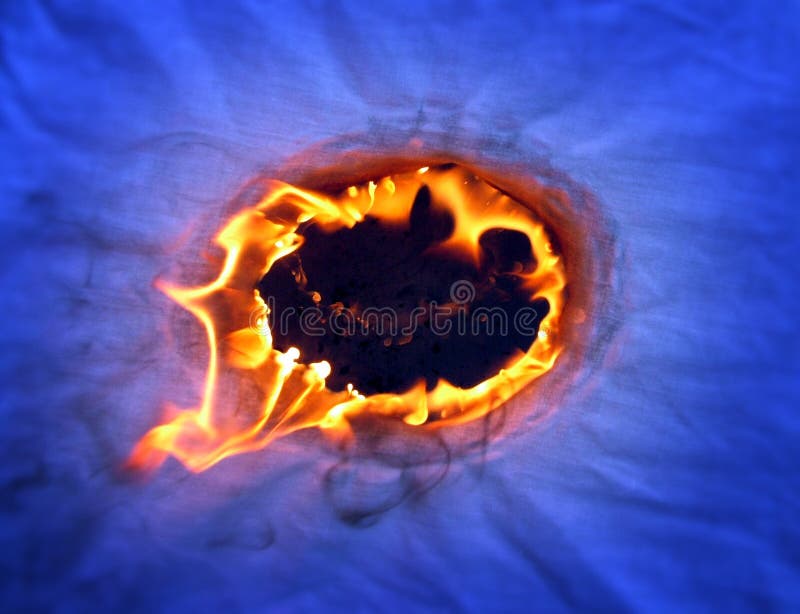 Burning hole in paper stock image. Image of sheet, impact - 12893045