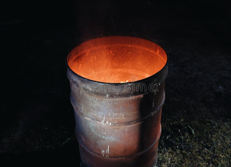 Fire Burning Inside a Metal Barrel Stock Image - Image of flames, trash ...