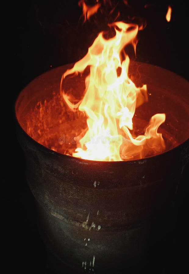 Fire Burning Inside a Metal Barrel Stock Image - Image of metal, burn ...