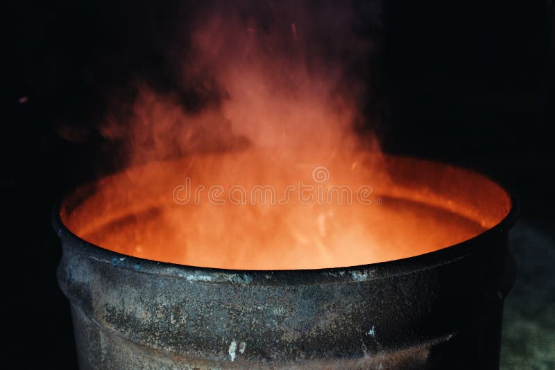 Fire Burning Inside a Metal Barrel Stock Photo - Image of pollution ...