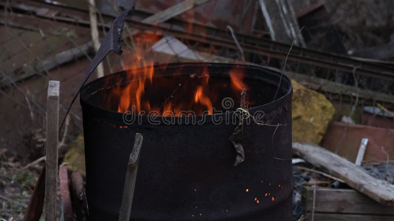 Fire Burning Inside an Old Rusty Barrel Outdoors Stock Footage - Video ...
