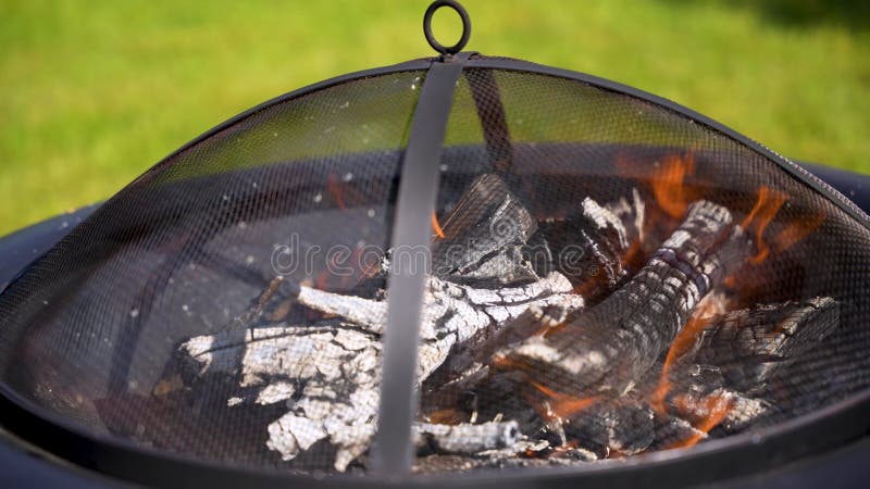A Fire is Burning in a Metal Fire Pit Stock Video - Video of heat ...