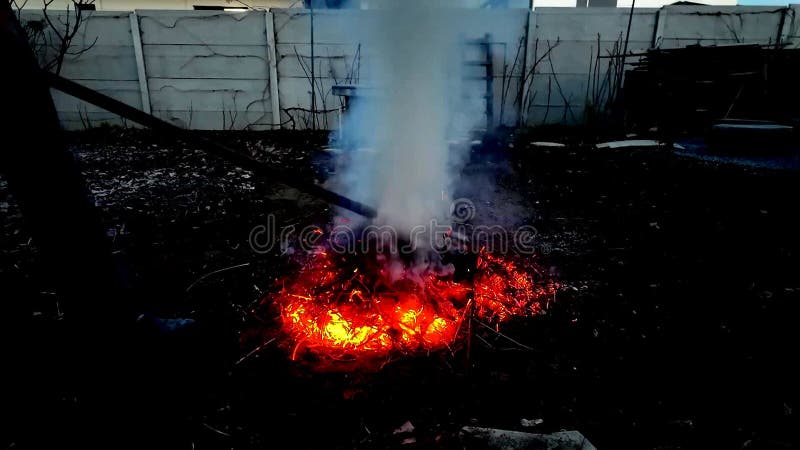 A Fire Burning Outside Ash Danger Stock Video - Video of glowing, burn ...
