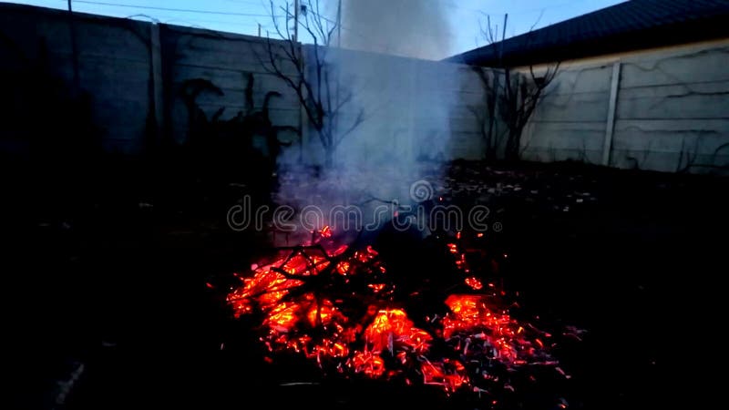 A Fire Burning Outside Ash Danger Stock Video - Video of fiery ...