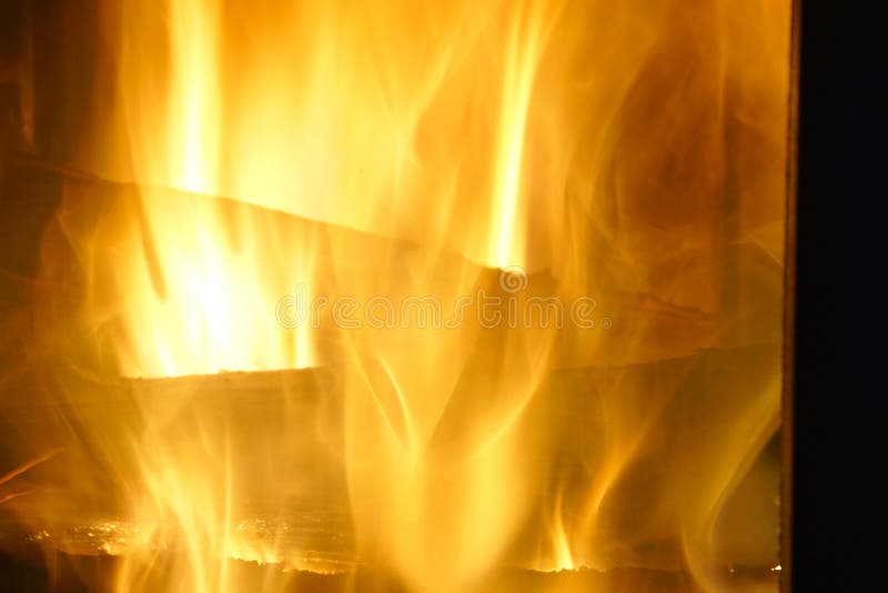 Fire. Burning Wood in the Fireplace. Bright Fire. Stock Image - Image ...