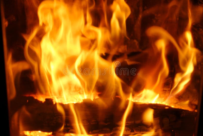 Fire. Burning Wood in the Fireplace. Bright Fire. Stock Image - Image ...