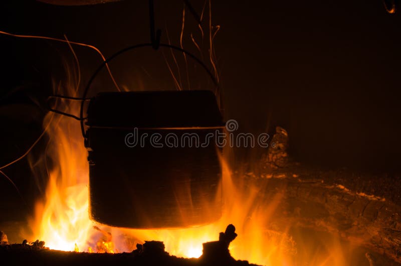 Fire Burns in the Campaign. Pot of Tea by the Fire Stock Photo - Image ...