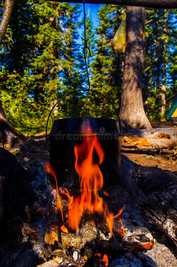 Fire Burns in the Campaign. Pot of Tea by the Fire Stock Photo - Image ...