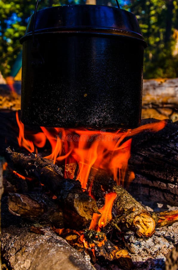 Fire Burns in the Campaign. Pot of Tea by the Fire Stock Photo - Image ...