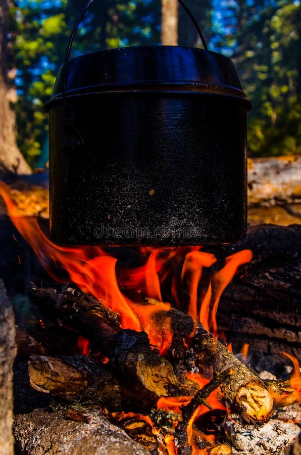 Fire Burns in the Campaign. Pot of Tea by the Fire Stock Photo - Image ...