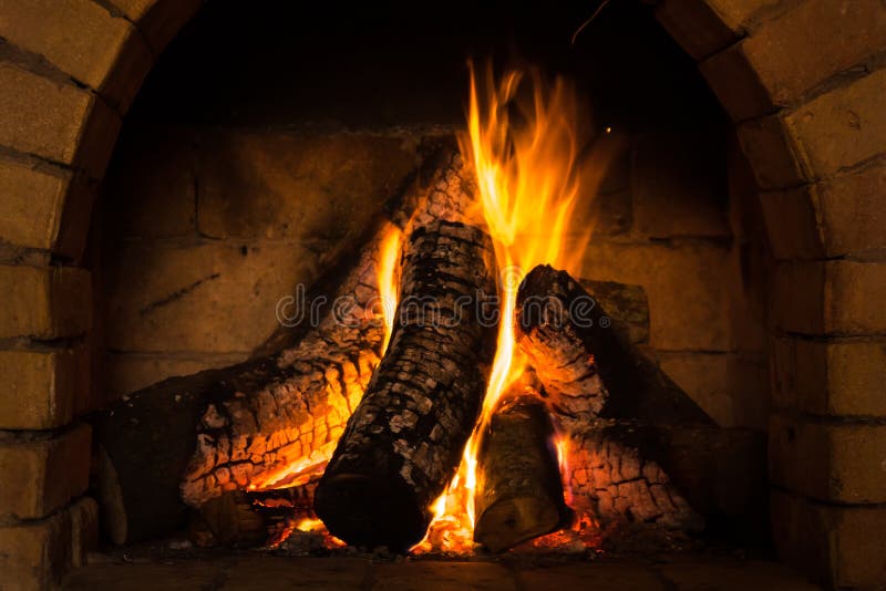 A Fire Burns in a Fireplace, Fire To Keep Warm Stock Photo - Image of ...