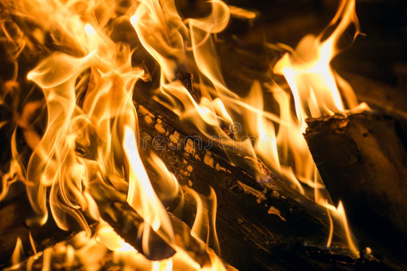 A Fire Burns in a Fireplace, Fire To Keep Warm. Stock Photo - Image of ...