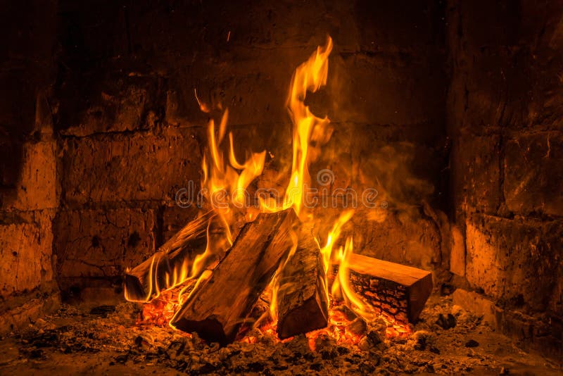 A Fire Burns in a Fireplace, Fire To Keep Warm Stock Photo - Image of ...