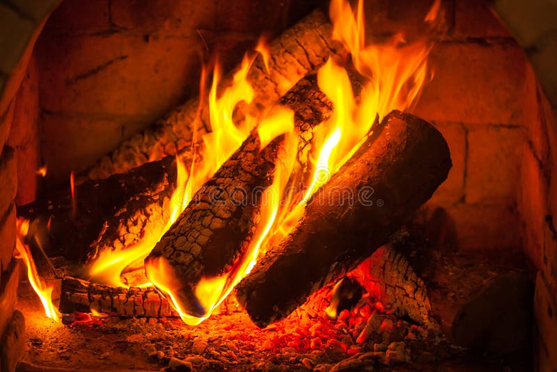 A Fire Burns in a Fireplace, Fire To Keep Warm Stock Photo - Image of ...