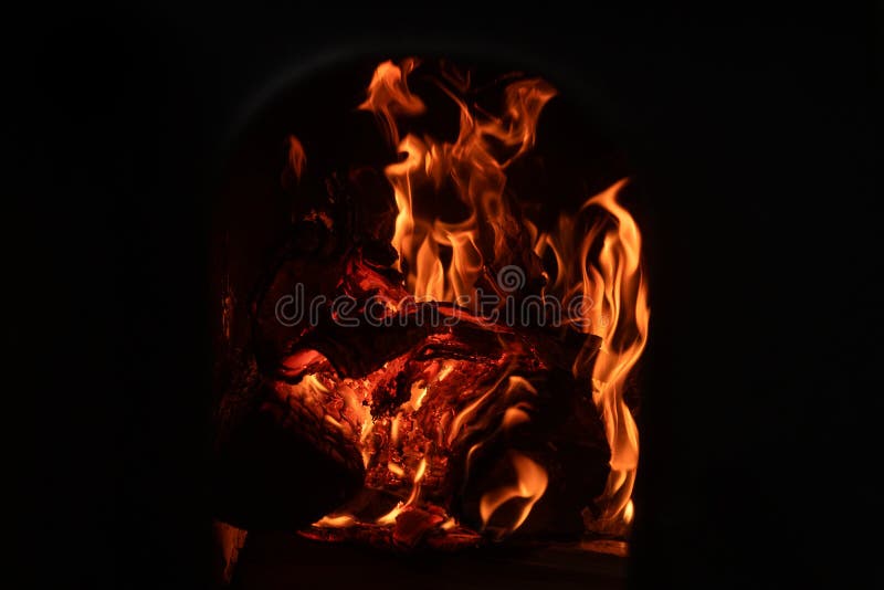 A Fire Burns in a Fireplace. Fire To Keep Warm Stock Image - Image of ...