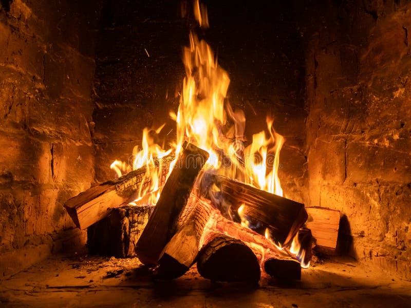 A Fire Burns in a Fireplace, Fire To Keep Warm Stock Image - Image of ...