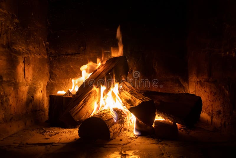 A Fire Burns in a Fireplace, Fire To Keep Warm Stock Image - Image of ...