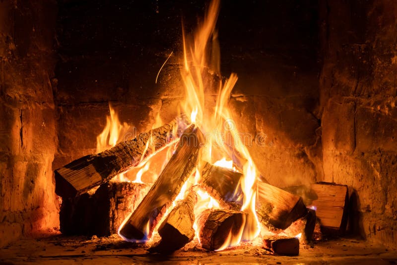 A Fire Burns in a Fireplace, Fire To Keep Warm Stock Photo - Image of ...