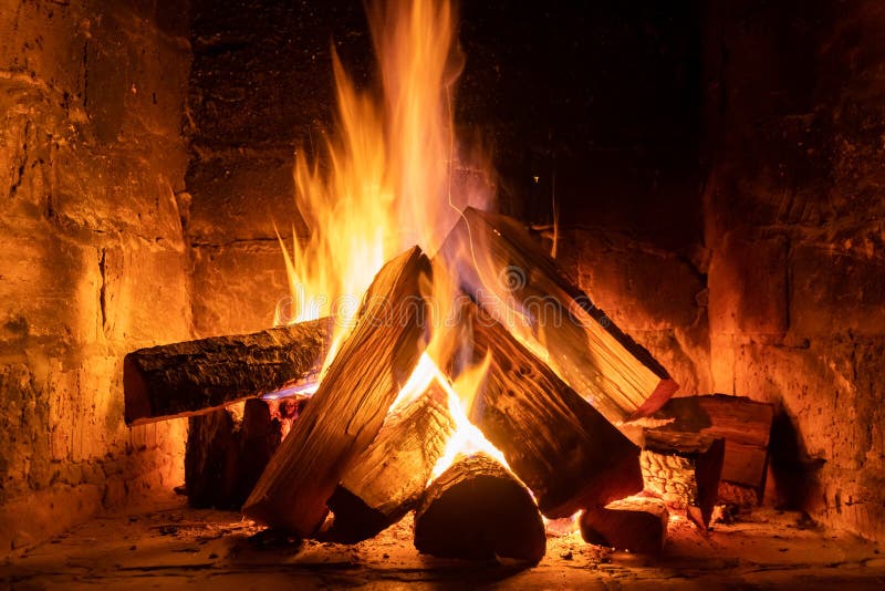 A Fire Burns in a Fireplace, Fire To Keep Warm Stock Photo - Image of ...