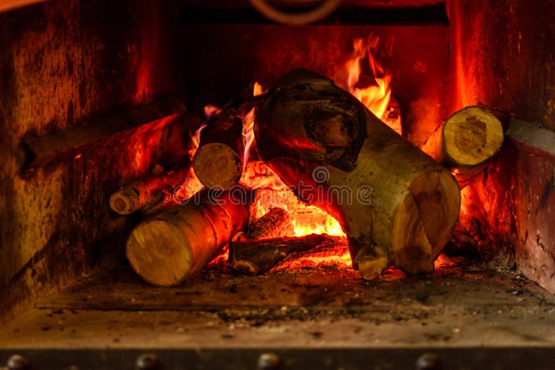Fire Burns Inside Fireplace To Create Warmth and Atmosphere of Comfort ...