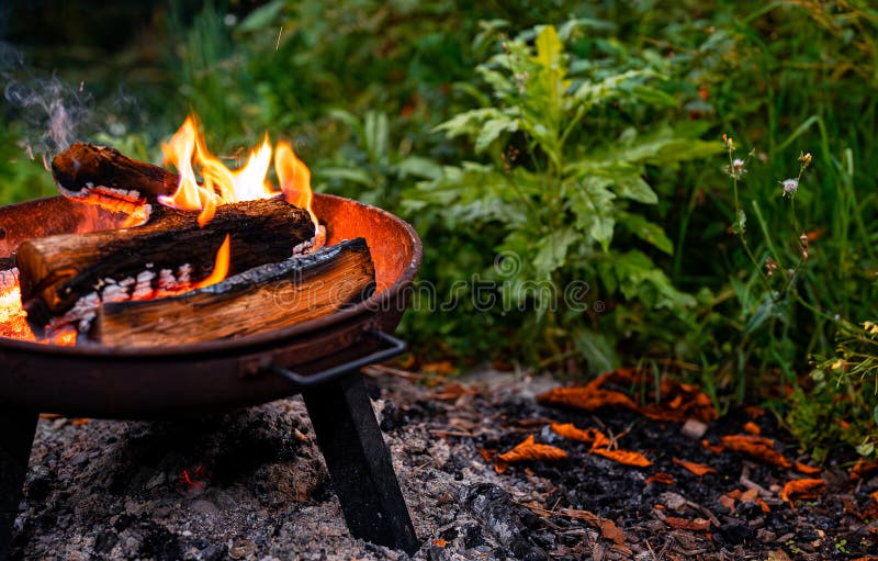 A Fire Burns at Night in a Barbecue Stock Photo - Image of campfire ...