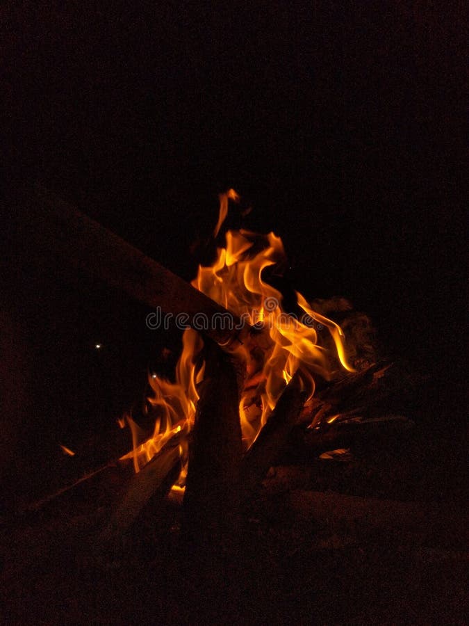 The Fire that Burns in the Silence of the Dark Night Stock Photo ...