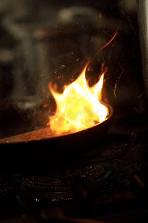 Fire is Coming from a Saucepan in the Stove Stock Photo - Image of ...