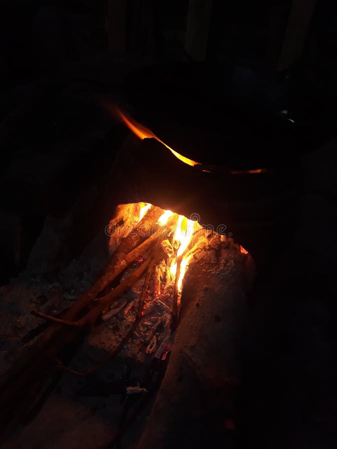 Fire and cook together stock image. Image of night, wildfire - 228848431