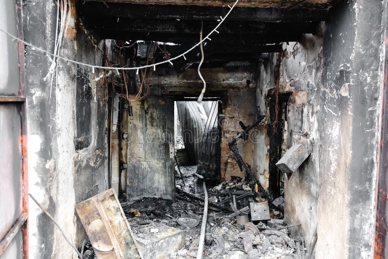 Fire-Damaged Building with Open Door Stock Photo - Image of hazardous ...