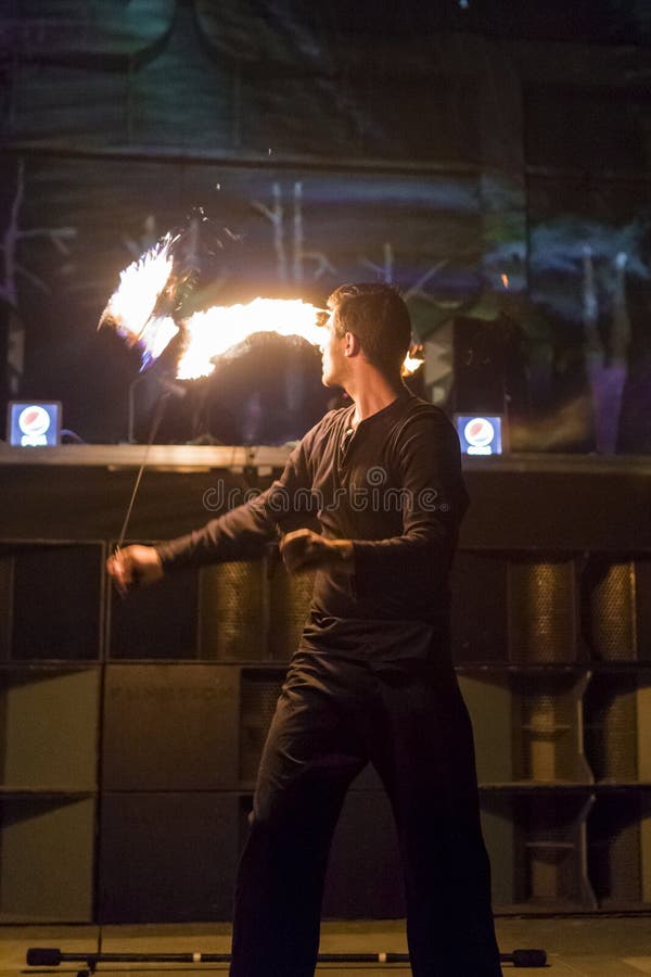 Fire dancer with a torch editorial stock image. Image of tourism - 35141374
