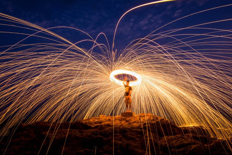 Fire Dancing Men stock photo. Image of fireworks, heat - 121615394