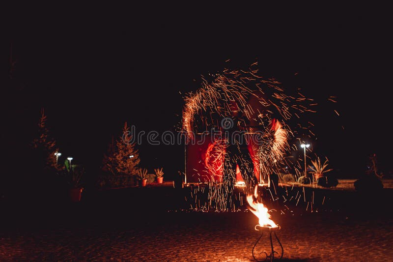 Fire Dancing Shows at Night. Amazing Fire Show As Part of Wedding ...