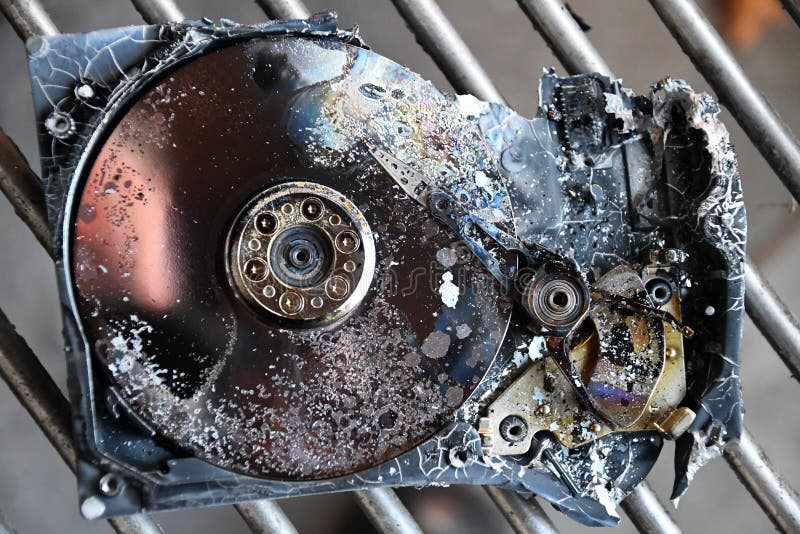 By Fire Destroyed Hard Disk Drive Stock Image - Image of molten ...