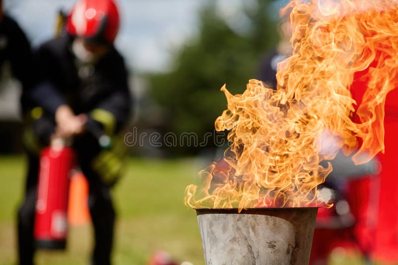 Fire Drill Training. Firefighters Practice Controlling an Outdoor Fire ...