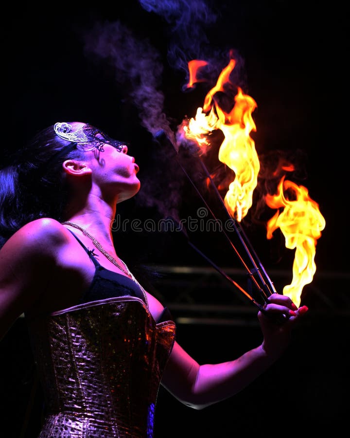 Fire Eater Girl editorial image. Image of entertain, flaming - 30182085