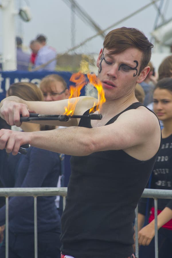 Fire Eater. editorial photo. Image of event, male, muscle - 58538861