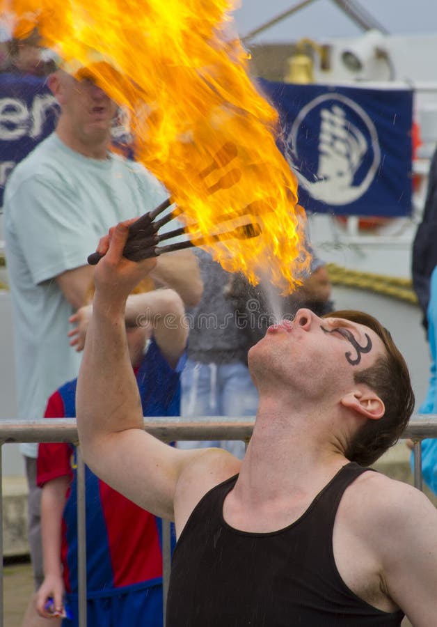 Fire Eater Girl editorial image. Image of entertain, flaming - 30182085
