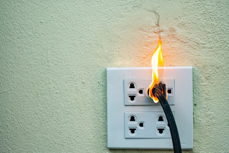 On Fire Electric Wire Plug Receptacle and Adapter on White Background ...