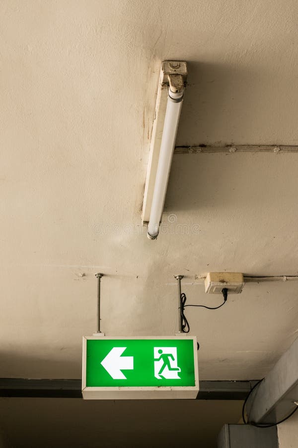 Fire emergency exit sign stock photo. Image of escape - 89292222