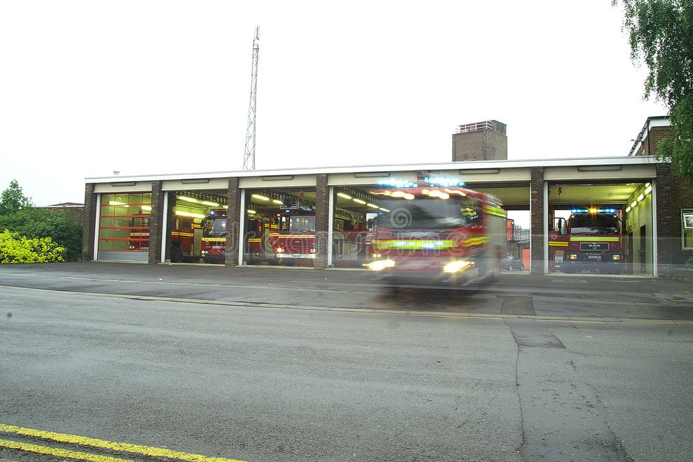 Fire engine on blue light editorial photo. Image of tender - 129073871