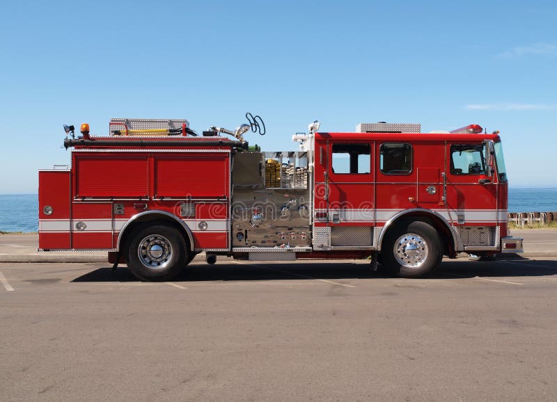 Fire Engine and Beach stock image. Image of ocean, truck - 10594697