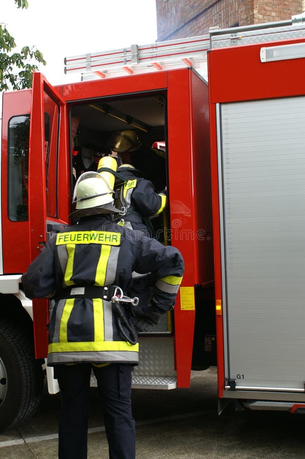 Fire engine on blue light editorial photo. Image of fire - 128910321