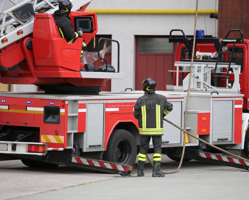 Fire Engine and Firefighters during an Emergency Editorial Photography ...